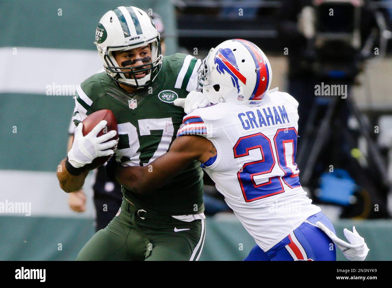Buffalo Bills cornerback Corey Graham (20) tackles New York Jets' Eric ...