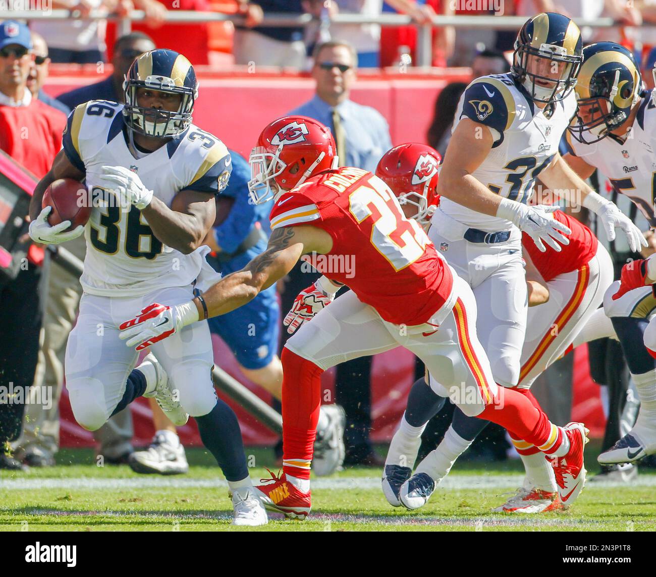 St. Louis Rams running back Benny Cunningham (36) runs from Kansas City ...
