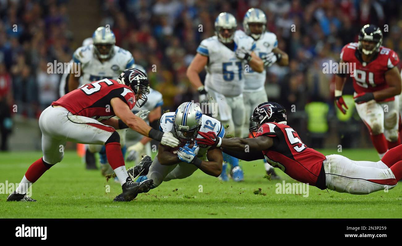 Detroit Lions wide receiver Jeremy Ross (12), centre, makes a down ...