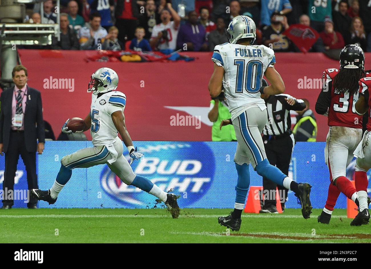 Detroit Lions running back Theo Riddick (25), left, crosses for a ...