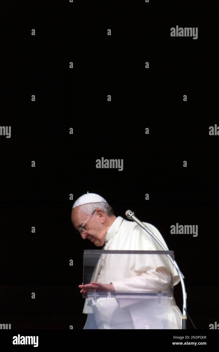 Pope Francis leaves after celebrating the Angelus noon prayer from the ...