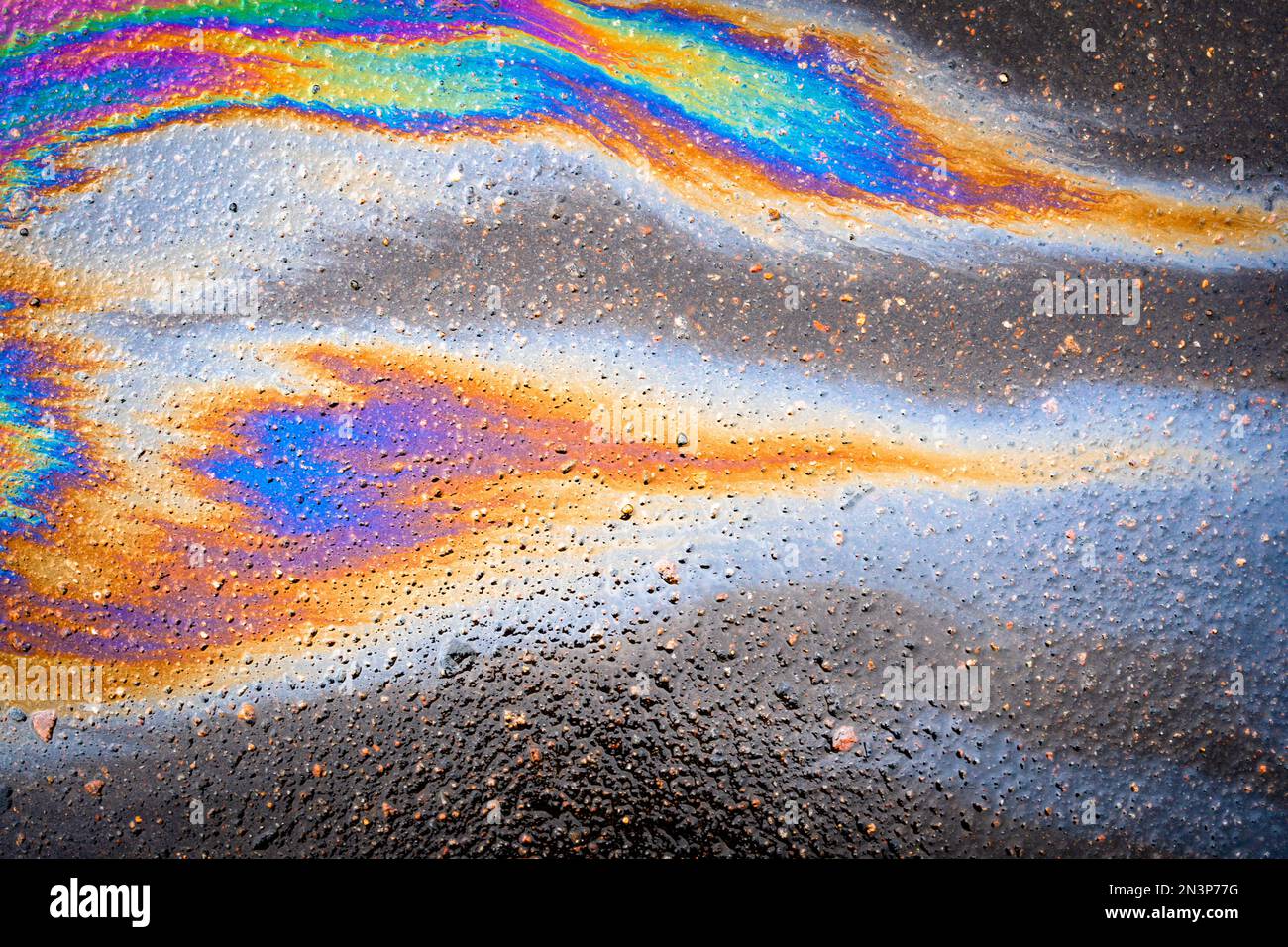 Colored texture of oil products on the asphalt in the rain Stock Photo ...