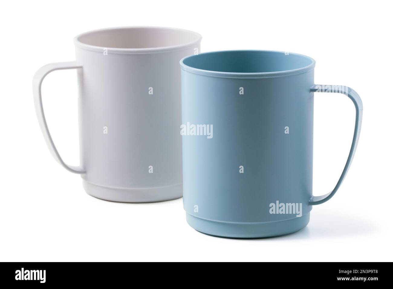 Two plastic mugs of different colors isolated on white background Stock ...