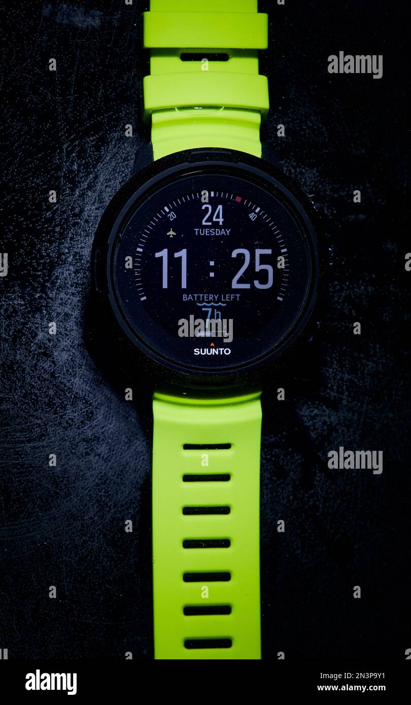 A vertical top view of Suunto D5 dive watch with a black screen and ...
