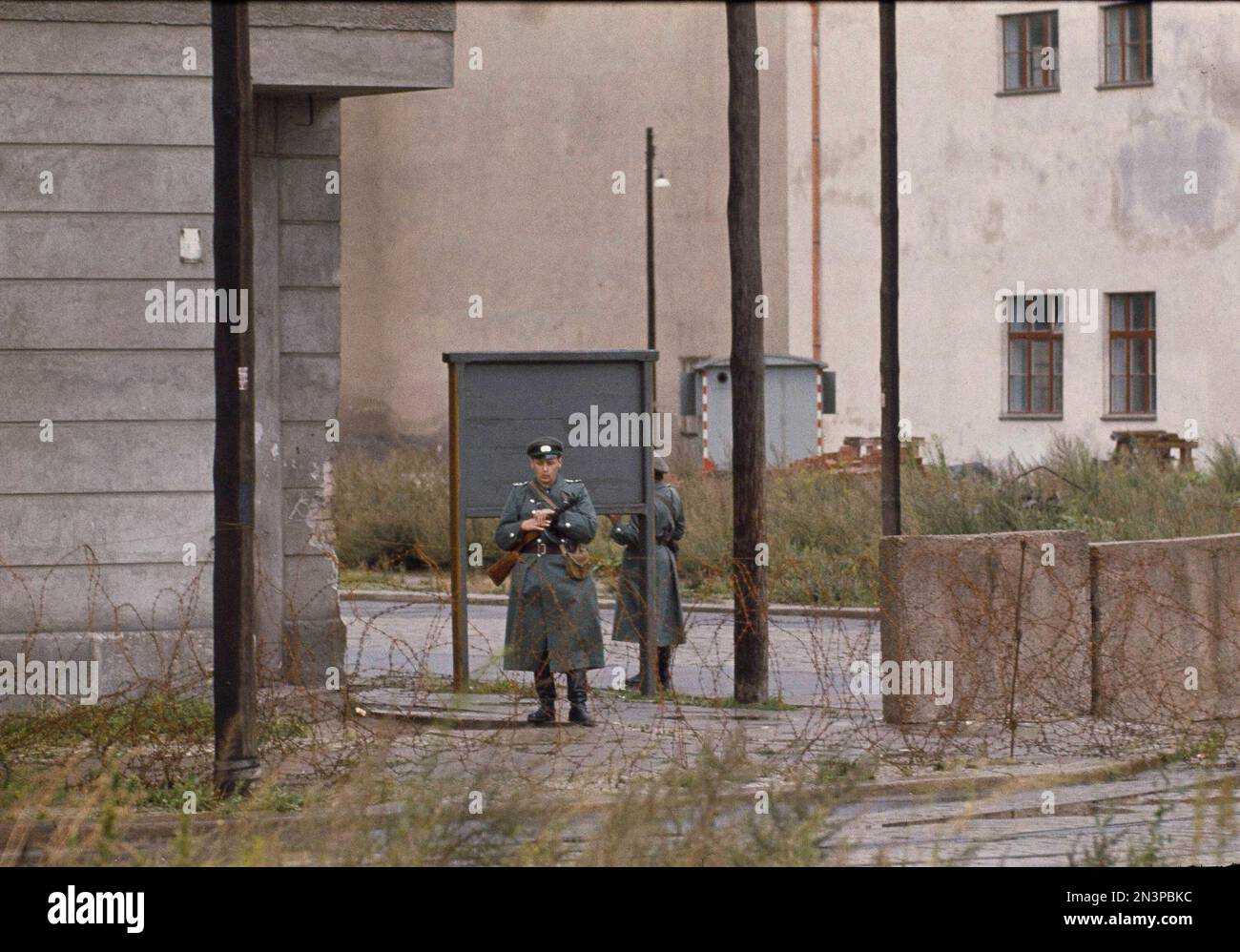 The East German "People's Police," aka VoPo, keep watch at a sector ...