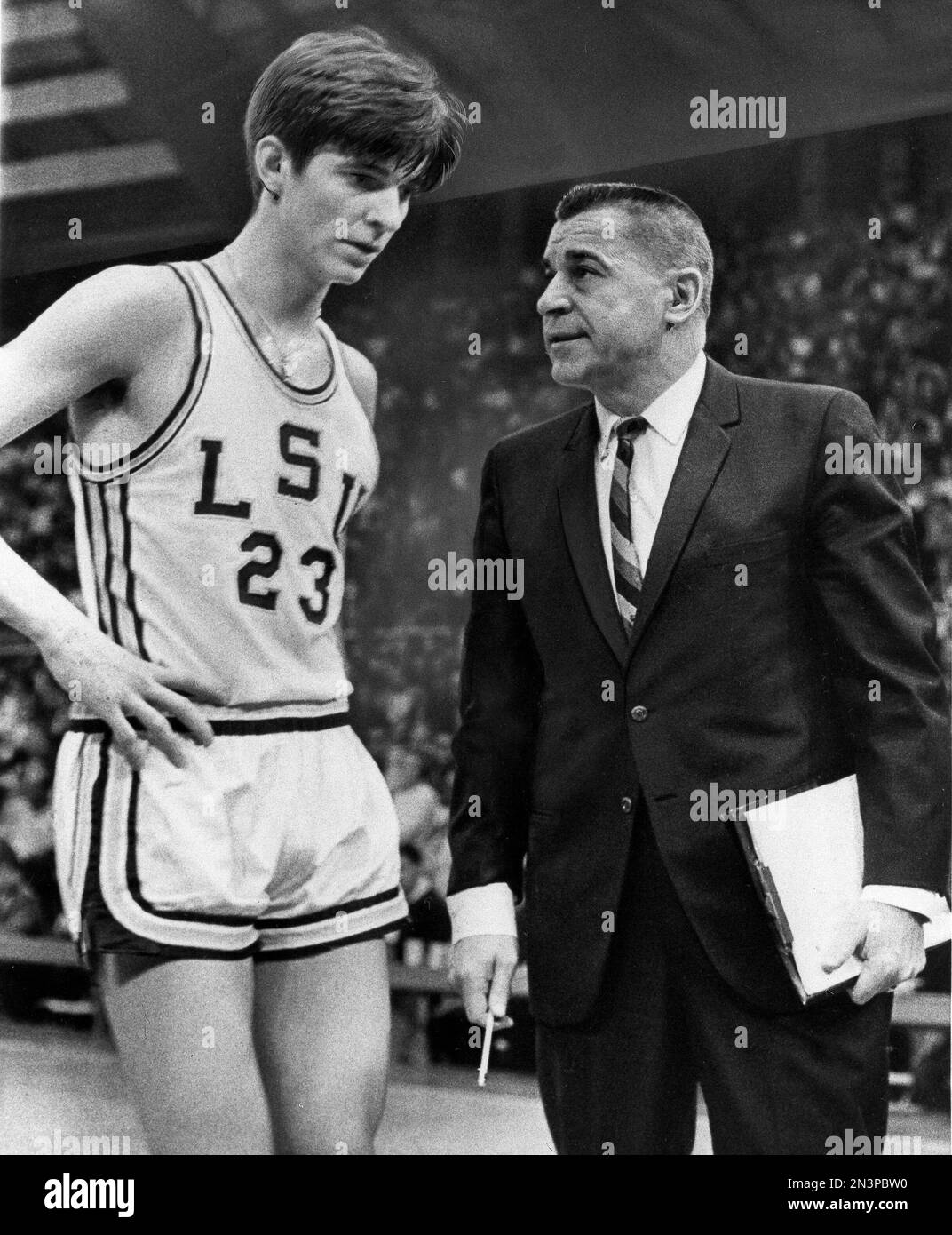 Press Maravich is pictured with his shooting star of a son, Pete of LSU ...