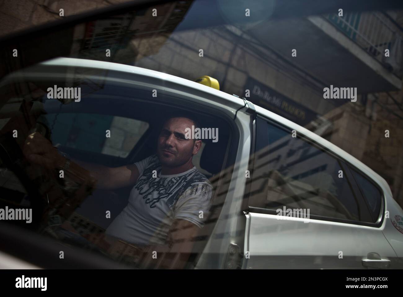 In this Thursday, July 17, 2014, photo, Israeli Taxi driver, Shai Ben ...