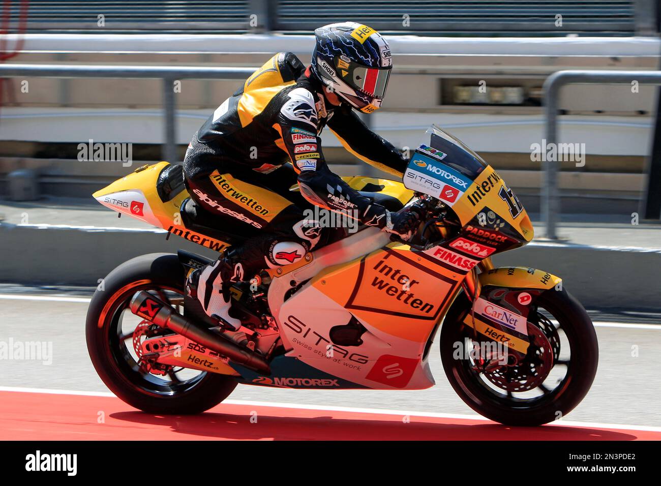Moto2 rider Thomas Luthi of Switzerland leaves his pit garage during ...