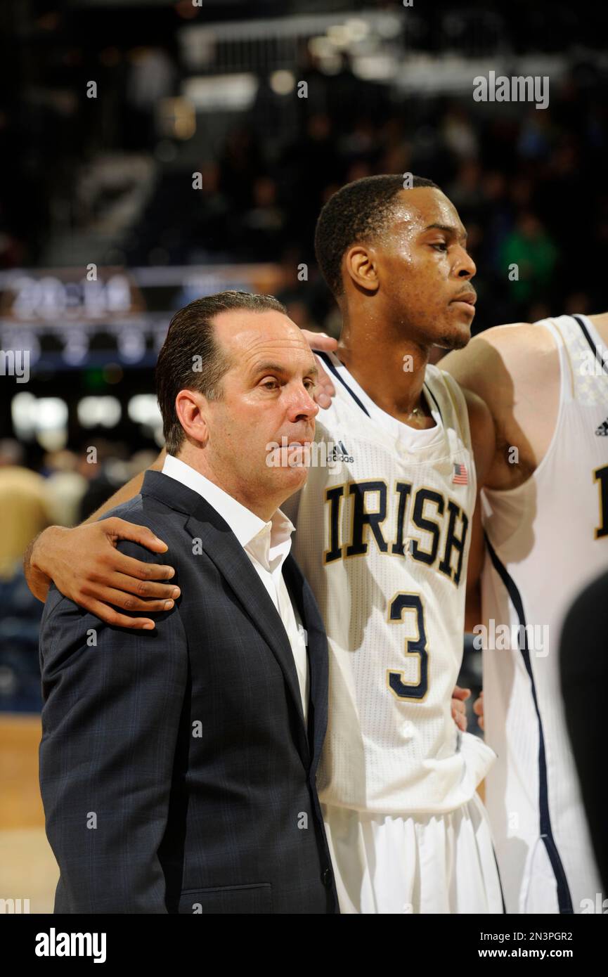 Notre Dame coach Mike Brey, left, and guard VJ Beachem after a college ...