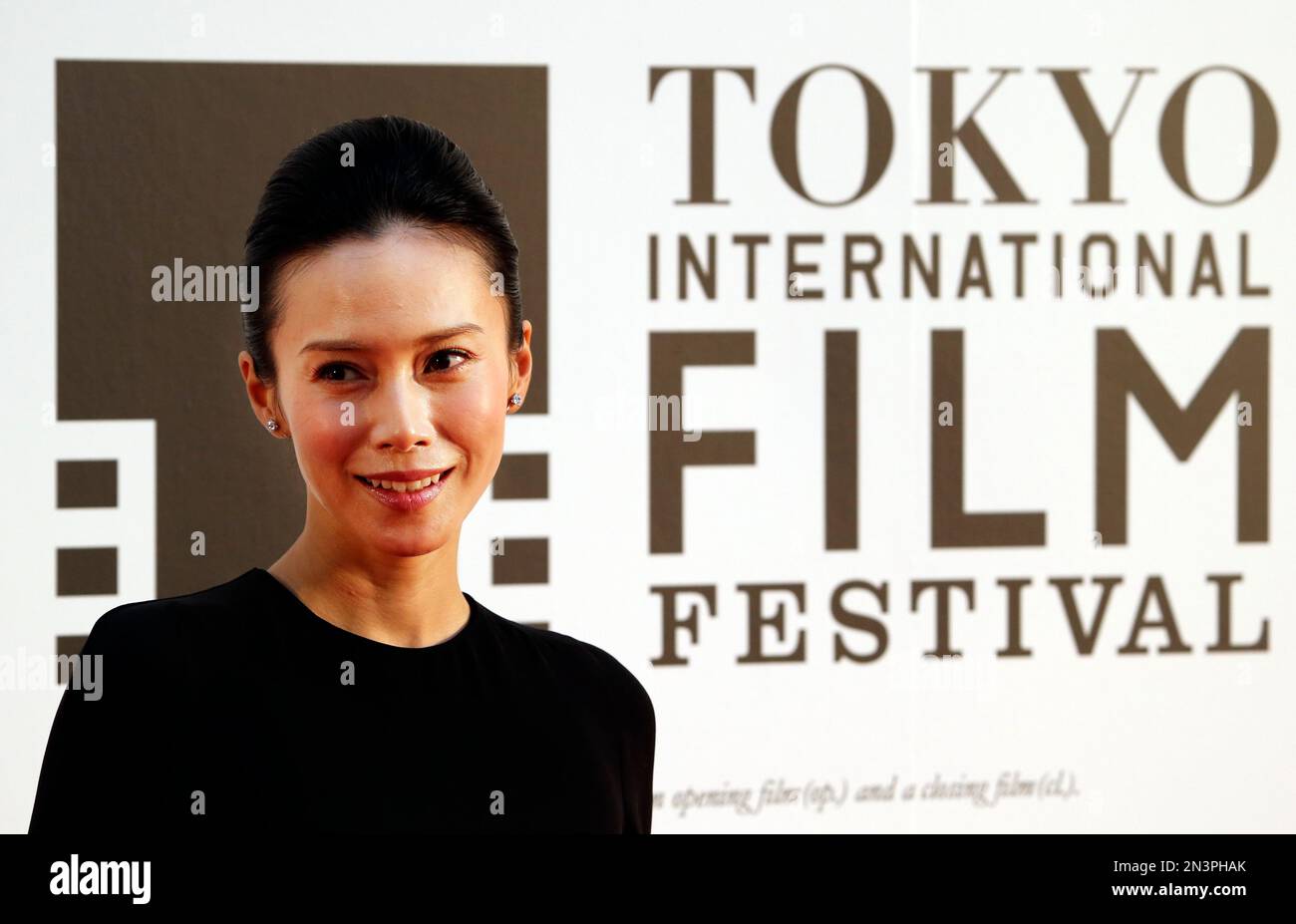 Japanese actress Miki Nakatani poses for photos during the opening ceremony of the 27th Tokyo ...