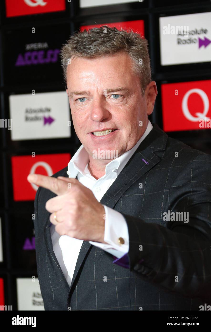Singer Graham McPherson, better known as Suggs, arrives on the red ...