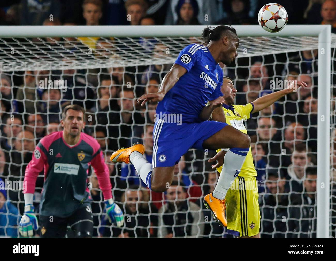 Chelsea's Didier Drogba, front right, vies for the ball with Maribor's ...