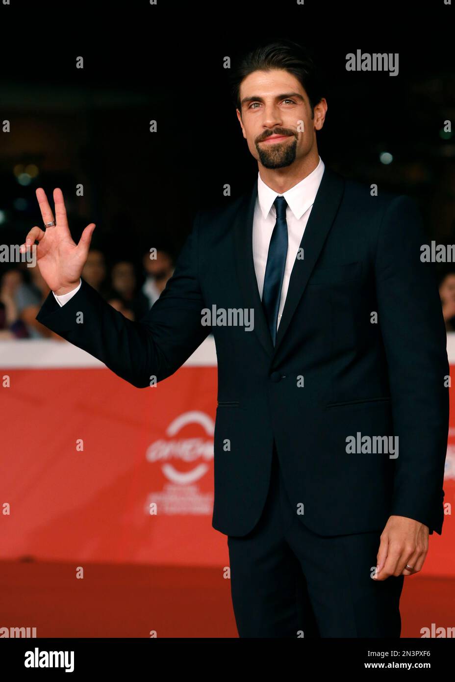 Italian actor Gilles Rocca poses on the red carpet as he arrives for ...