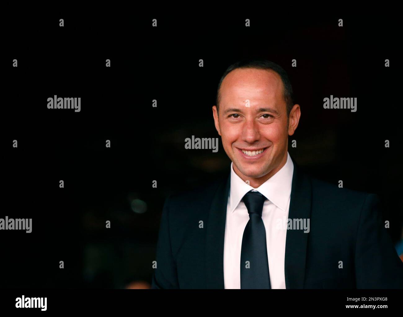 Italian actor Emiliano Ragno poses on the red carpet as he arrives for ...