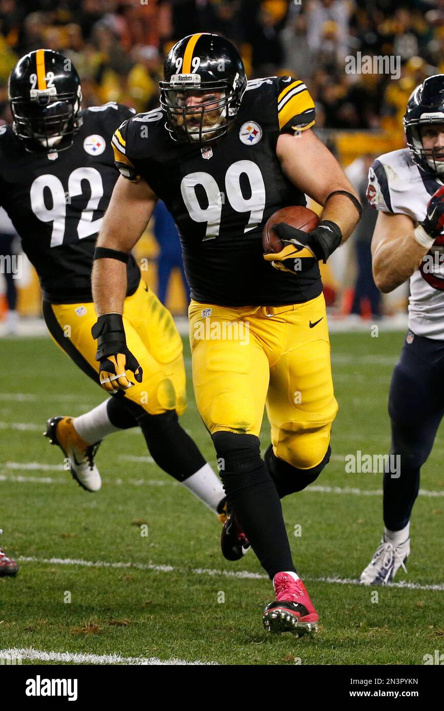 Pittsburgh Steelers defensive end Brett Keisel (99) runs after ...