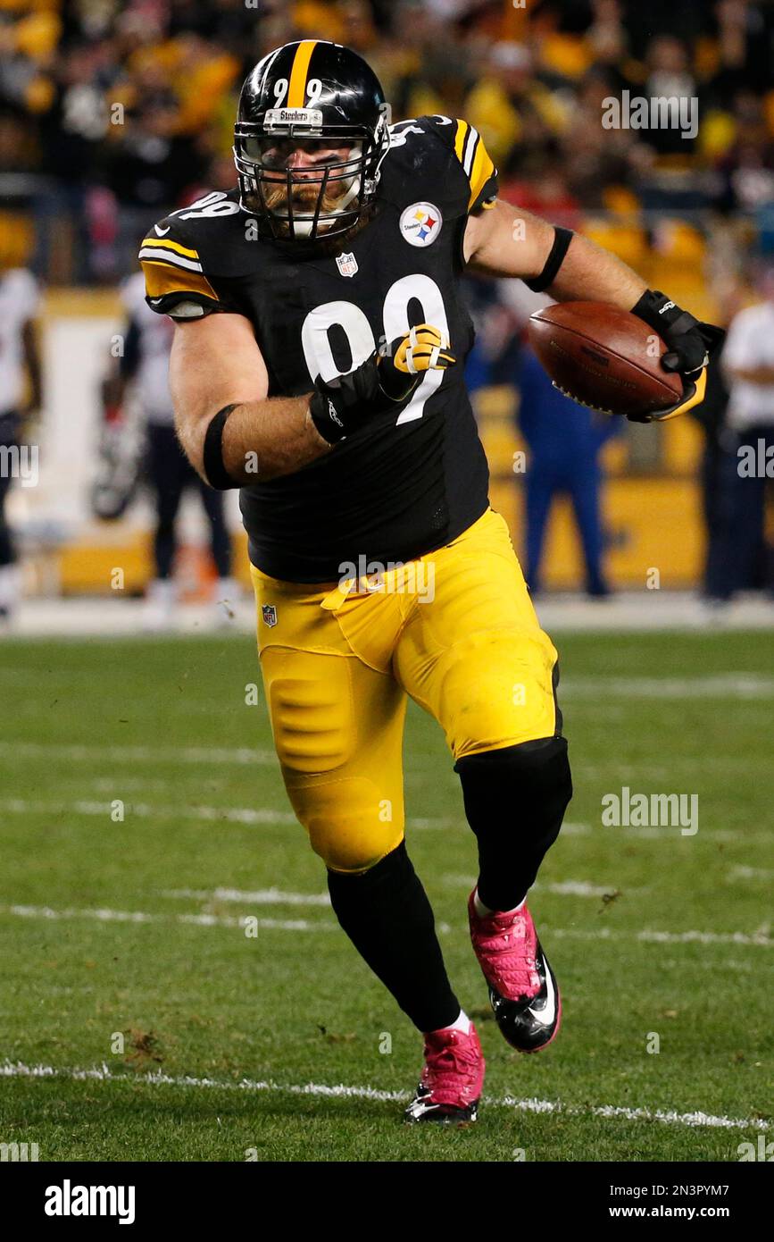Pittsburgh Steelers defensive end Brett Keisel (99) runs after ...