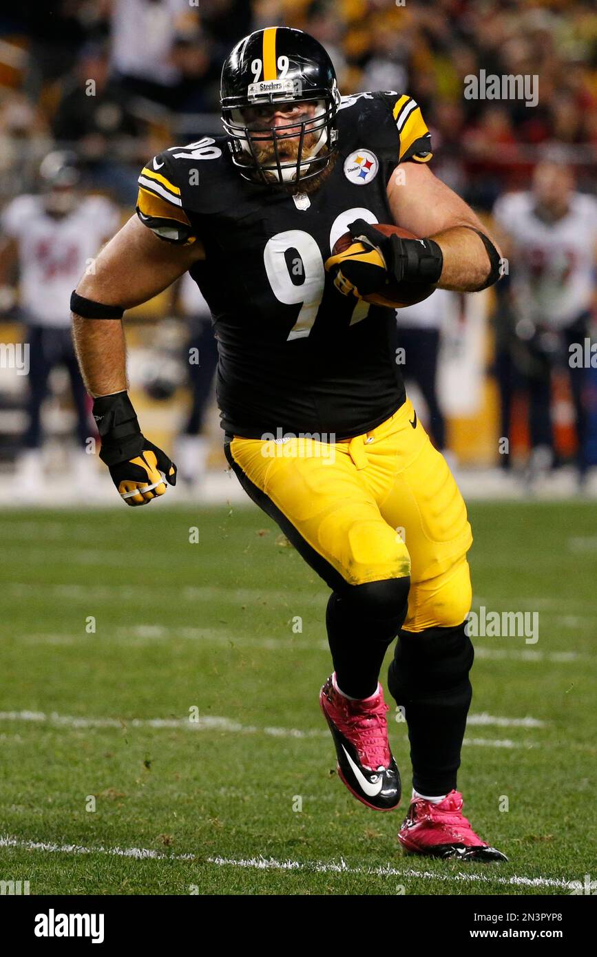 Pittsburgh Steelers defensive end Brett Keisel (99) runs after ...