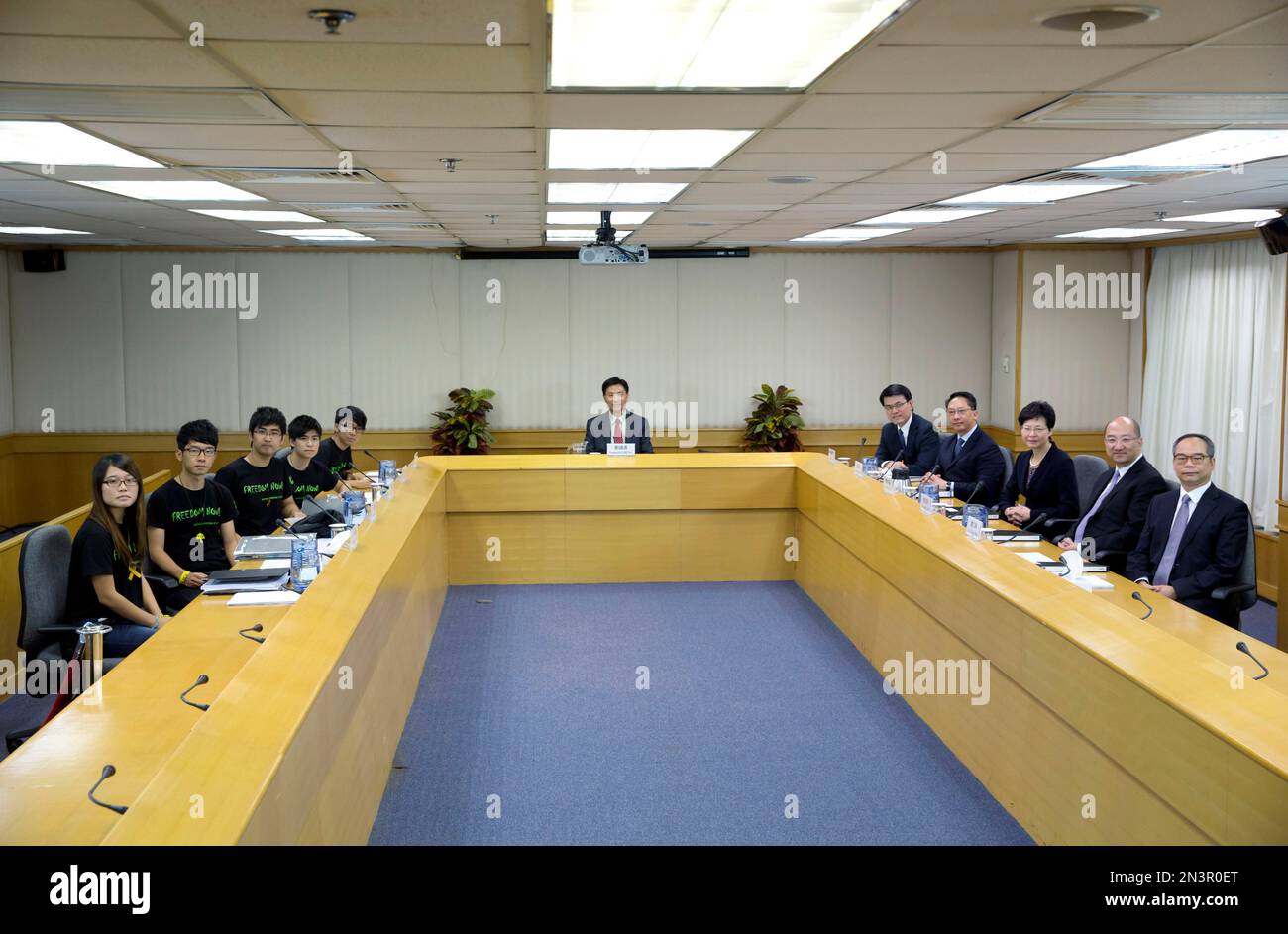 Hong Kong government officials, from right, the Constitutional and ...