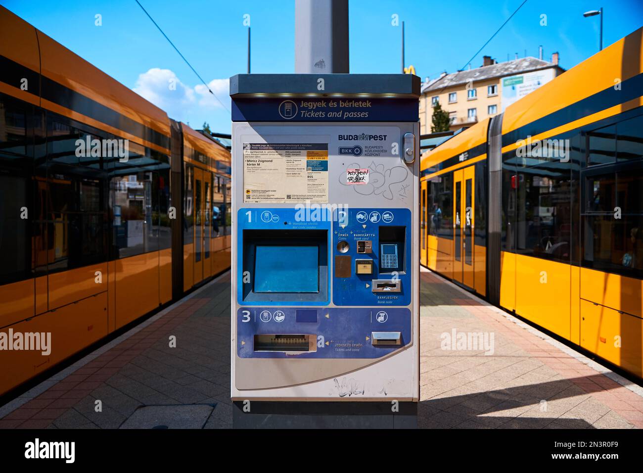 A tram ticket machine installed at a tram stop. Budapest, Hungary - 08. ...