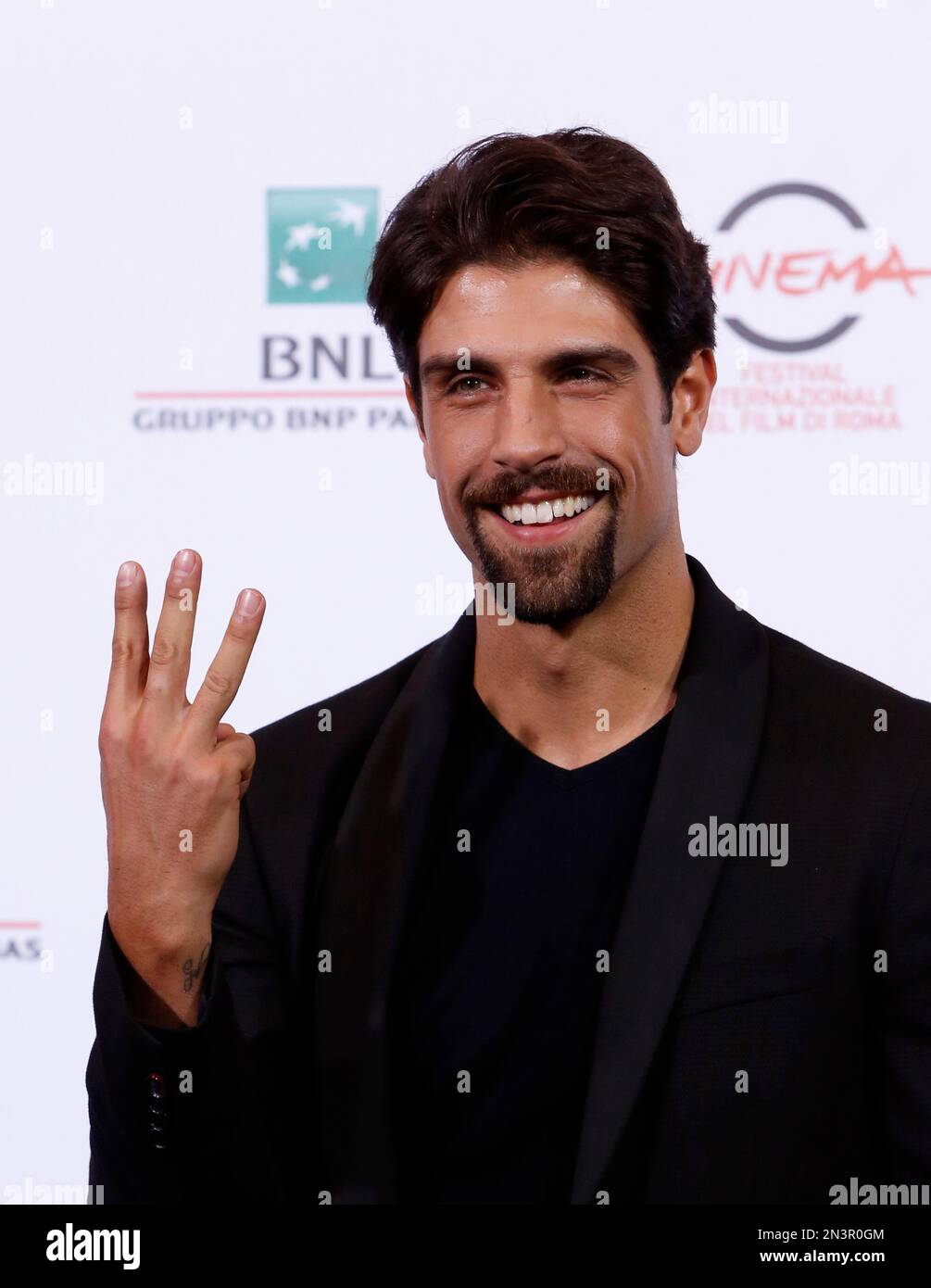 Italian actor Gilles Rocca poses during a photo call for the movie 'Tre ...