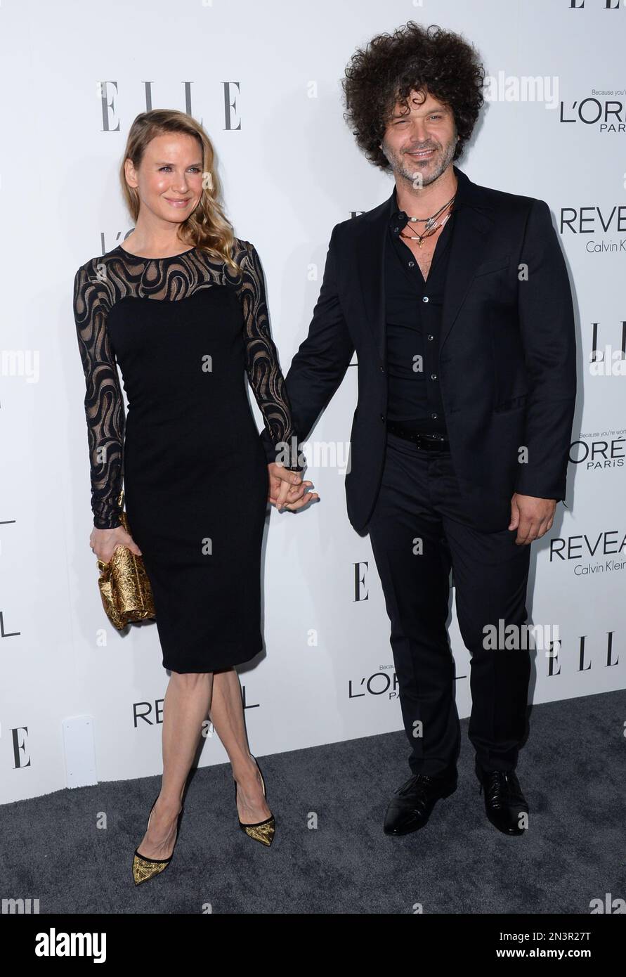 Renee Zellweger, left, and Doyle Bramhall II arrive at ELLE's 21st ...