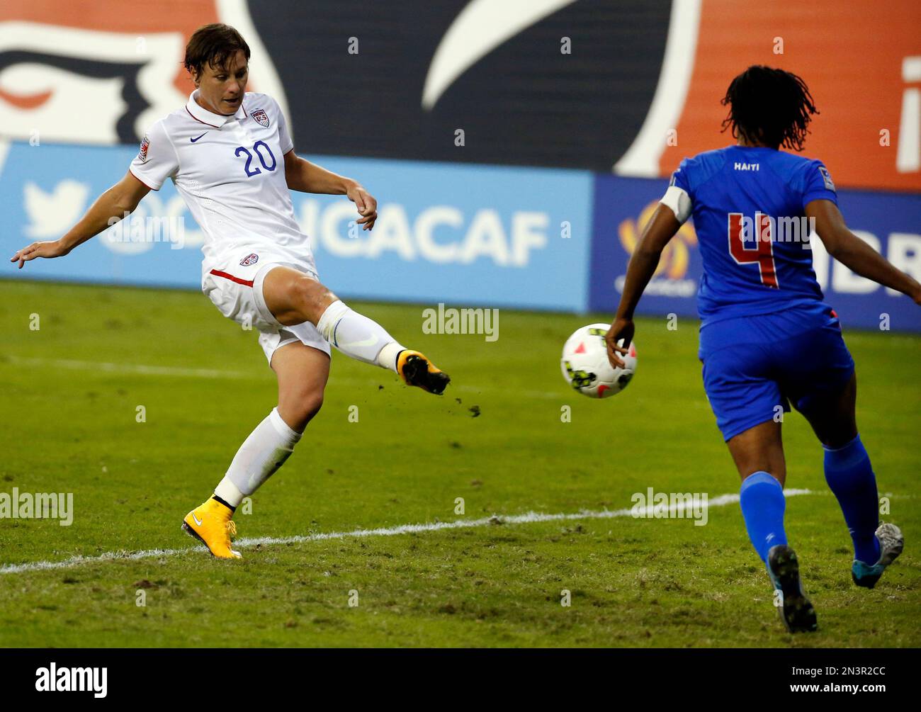 United States forward Abby Wambach (20) scores a goal past Haiti ...