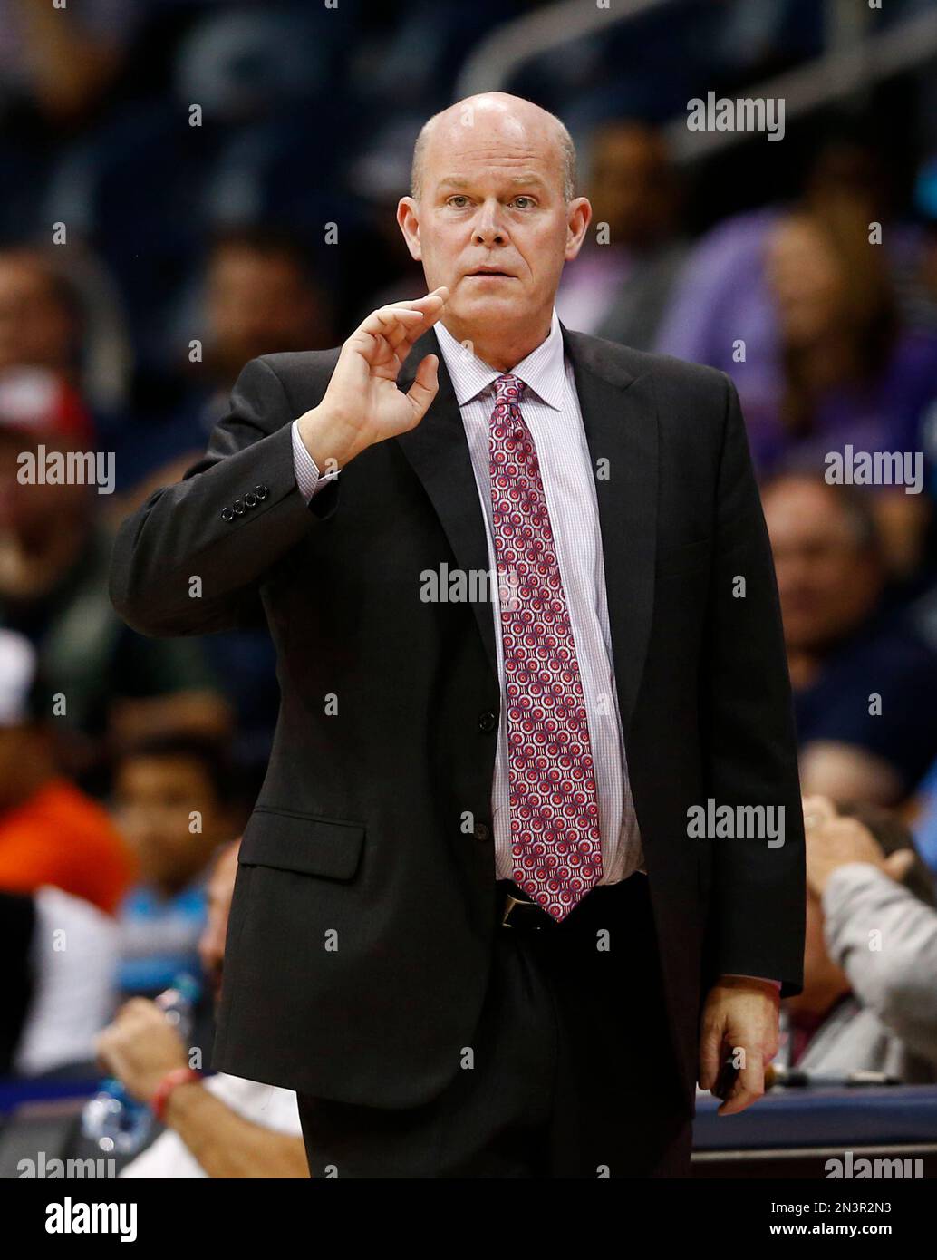 Charlotte Hornets head coach Steve Clifford directs his team from the ...