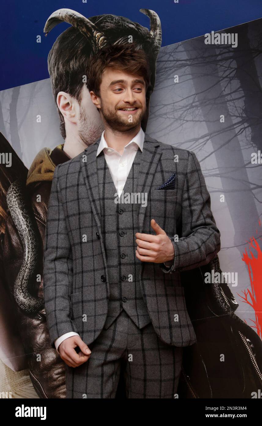 Actors Daniel Radcliffe poses for photographers against his cardboard ...