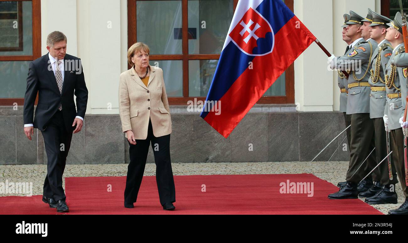 Slovakia's Prime Minister Robert Fico and German Chancellor Angela ...