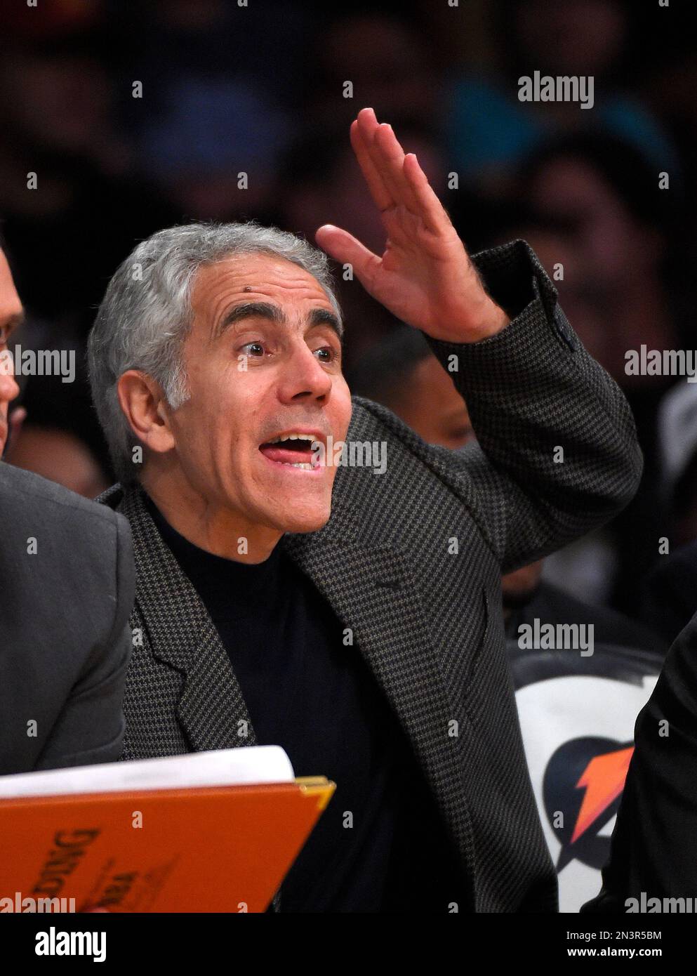 Los Angeles Lakers assistant coach Jim Eyen yells to the team during ...
