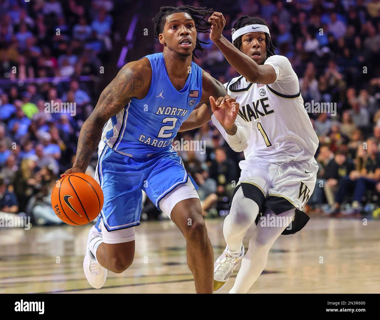February 7, 2023: North Carolina junior Caleb Love (2) drives past Wake ...