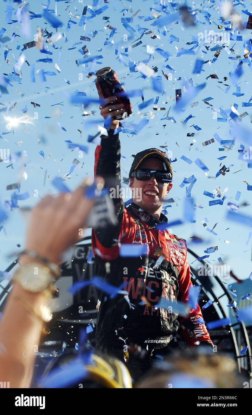 Brad Keselowski celebrates in Victory Lane after winning the NASCAR ...