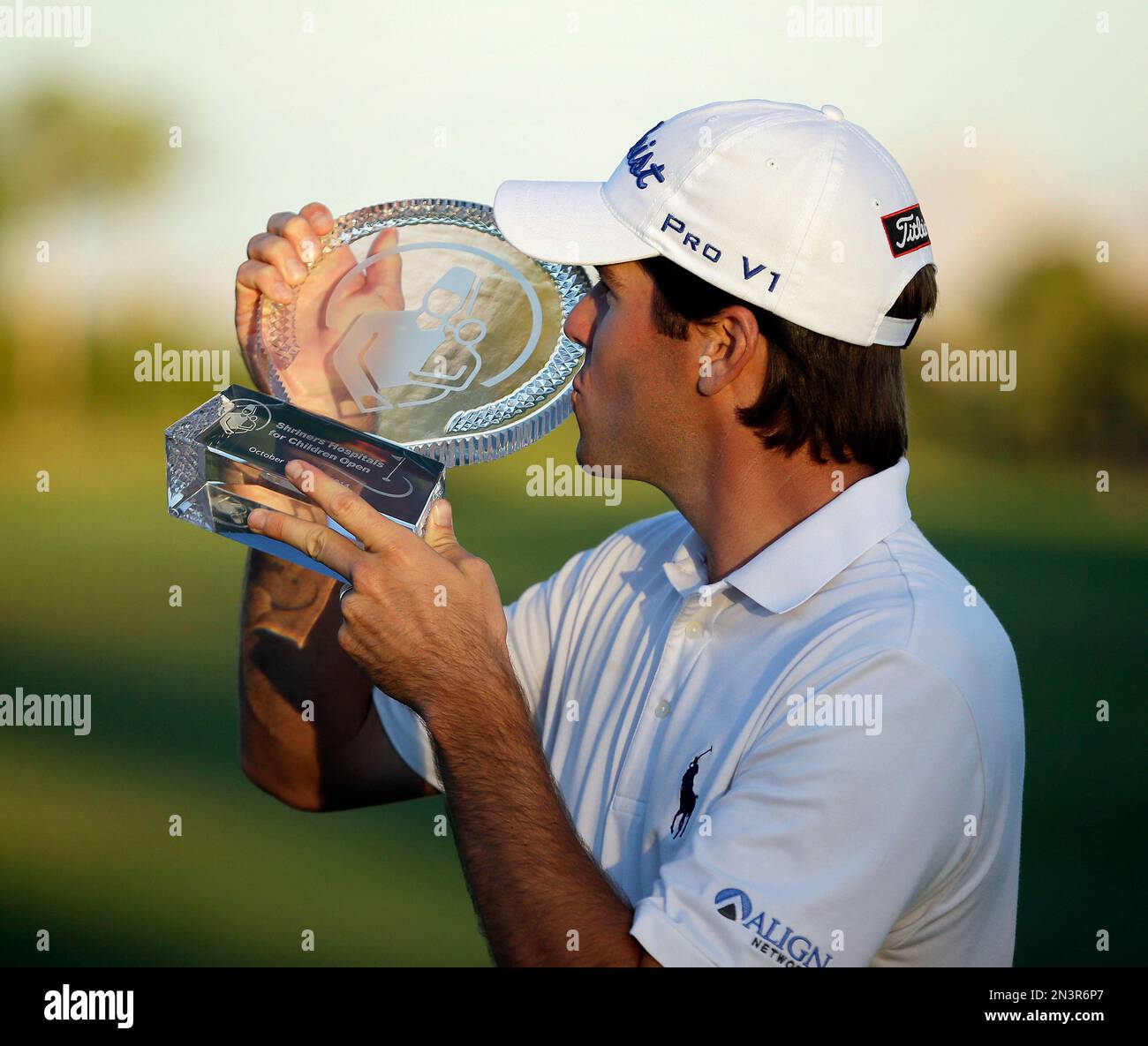 Ben Martin kisses the trophy after winning the Shriners Hospitals for ...