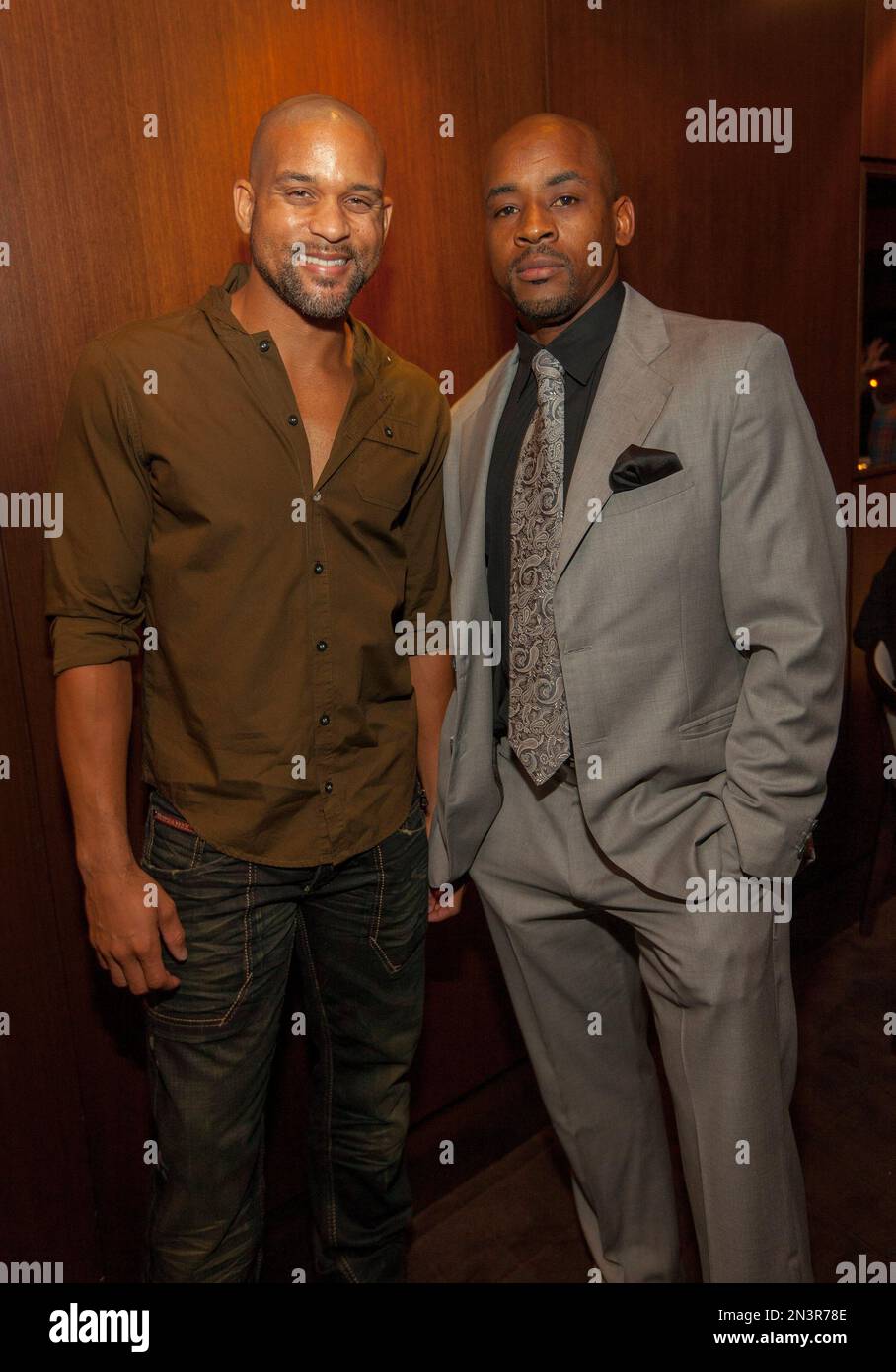 Celebrity fitness trainer Shaun T and former Chicago Bear Rashied Davis ...