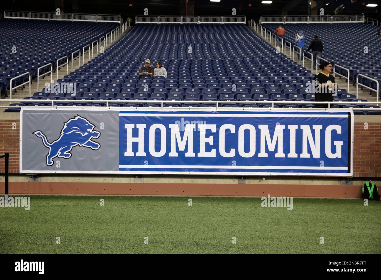A homecoming banner welcomes back former Detroit Lions players to a NFL ...