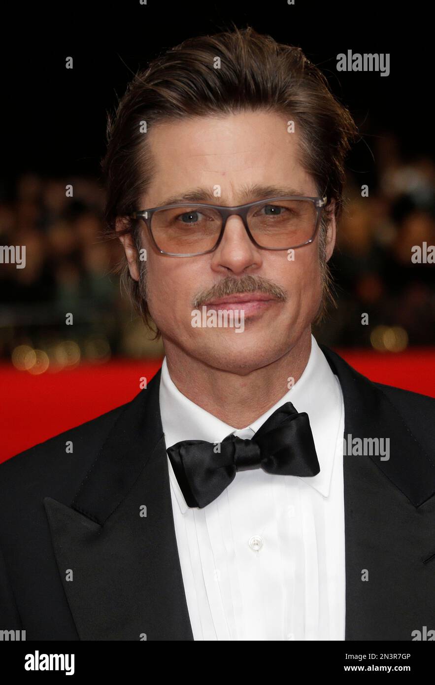 Actor Brad Pitt poses for photographers at the premiere for the film ...