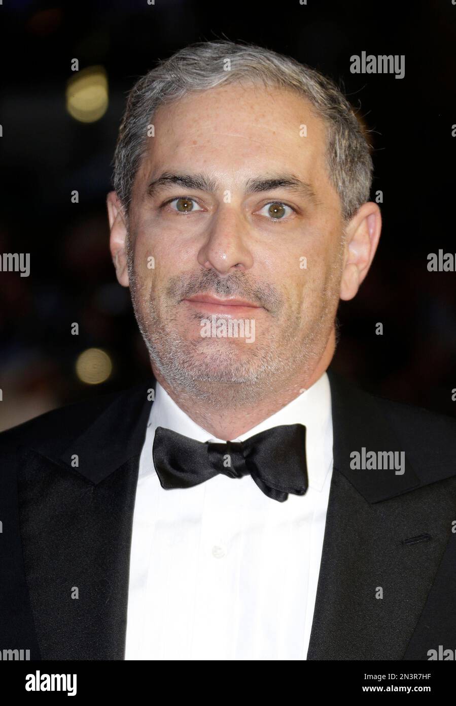 John Lesher poses for photographers at the premiere for the film Fury ...