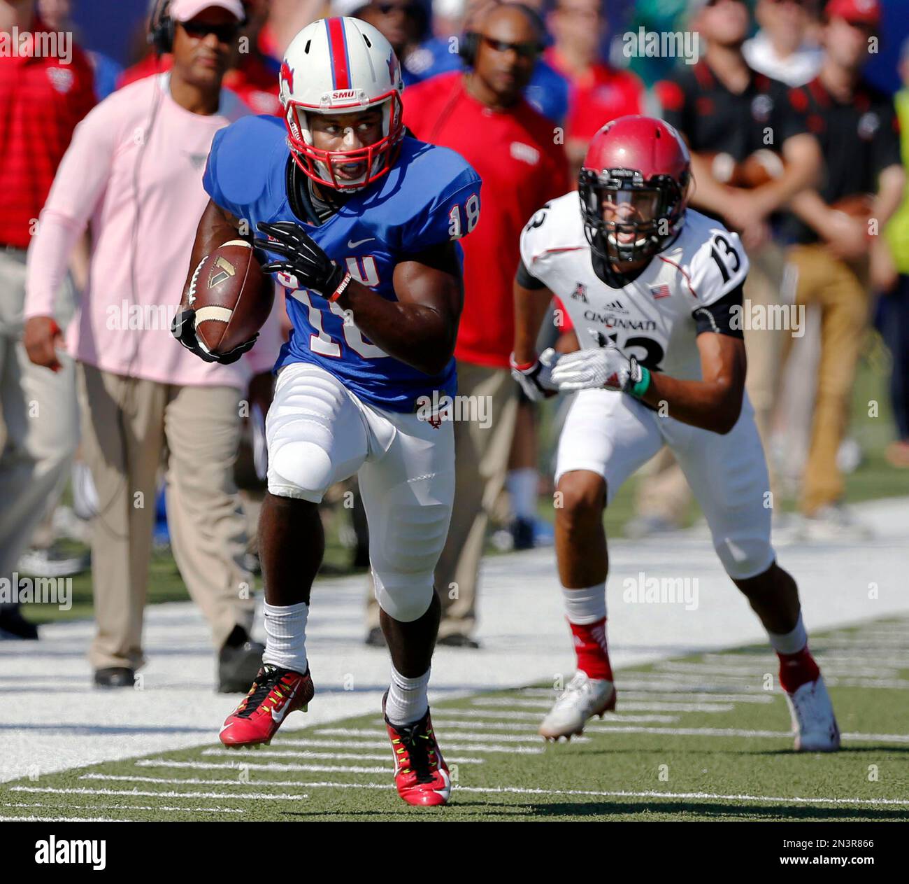 SMU wide receiver Darius Joseph (18) brings his pass reception upfield ...