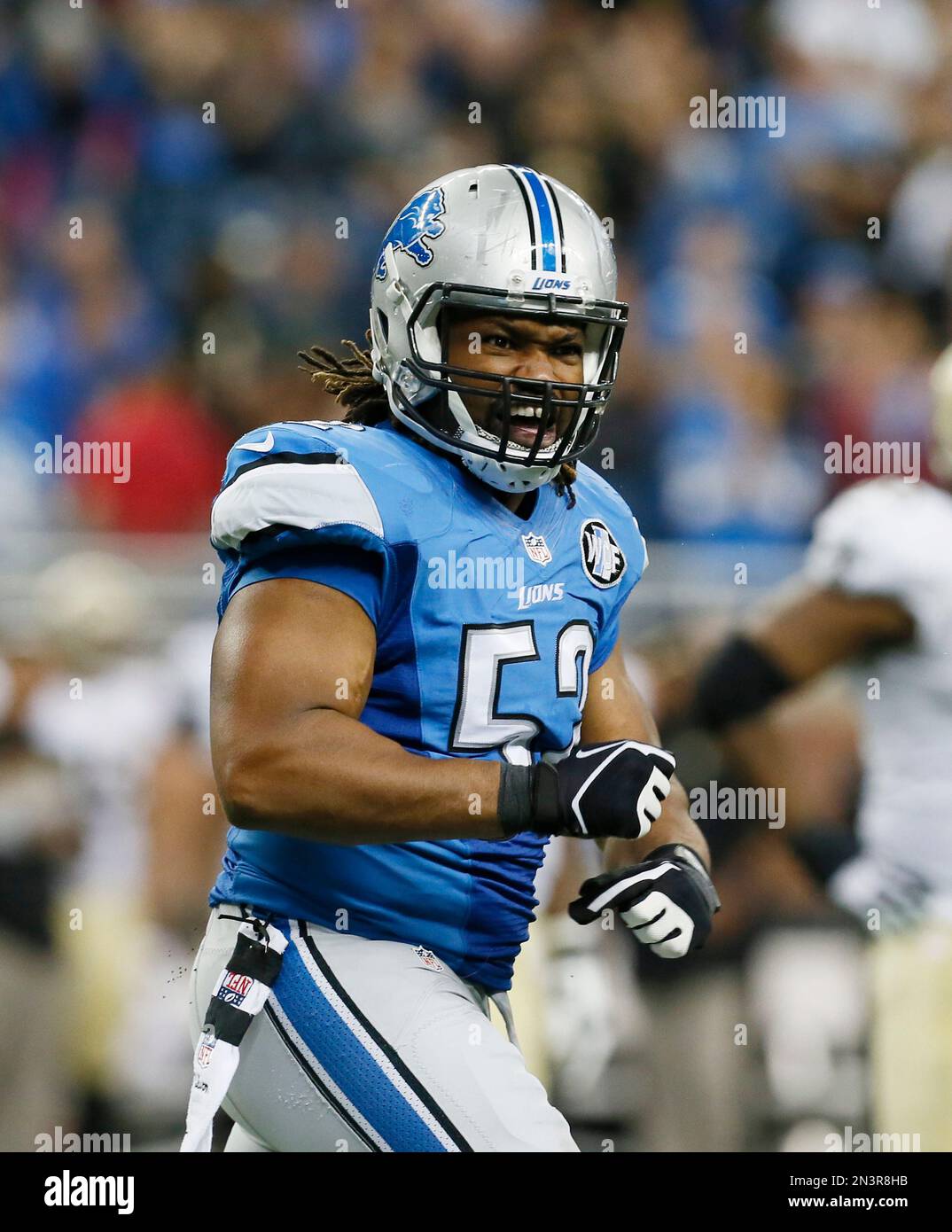 Detroit Lions defensive end Darryl Tapp (52) reacts after a play during ...