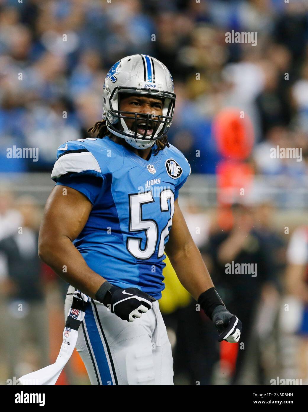 Detroit Lions defensive end Darryl Tapp (52) reacts after a play during ...