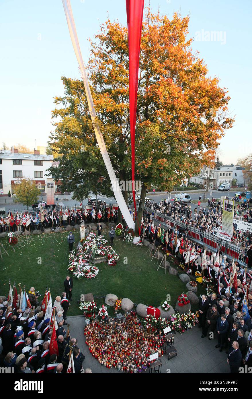 An honour guard pays tribute to Polish priest Jerzy Popieluszko during ...