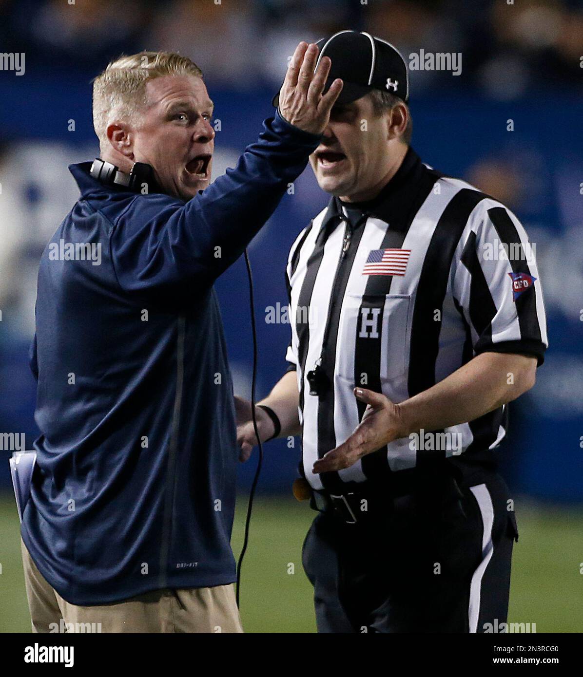 Nevada head coach Brian Polian argues with an official during the first ...