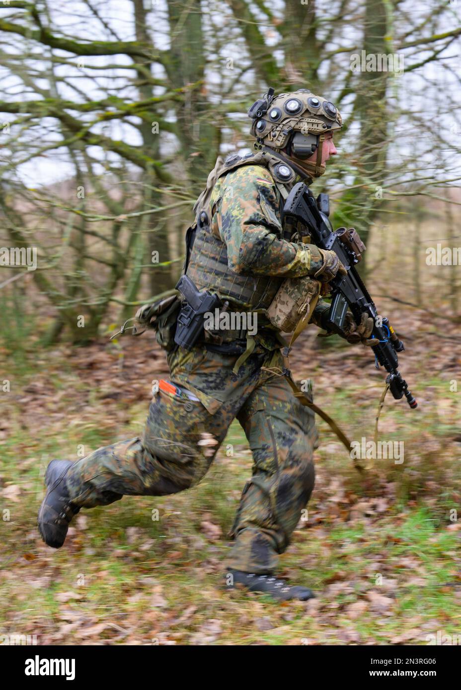 Gardelegen, Germany. 24th Jan, 2023. A Bundeswehr soldier walks through ...
