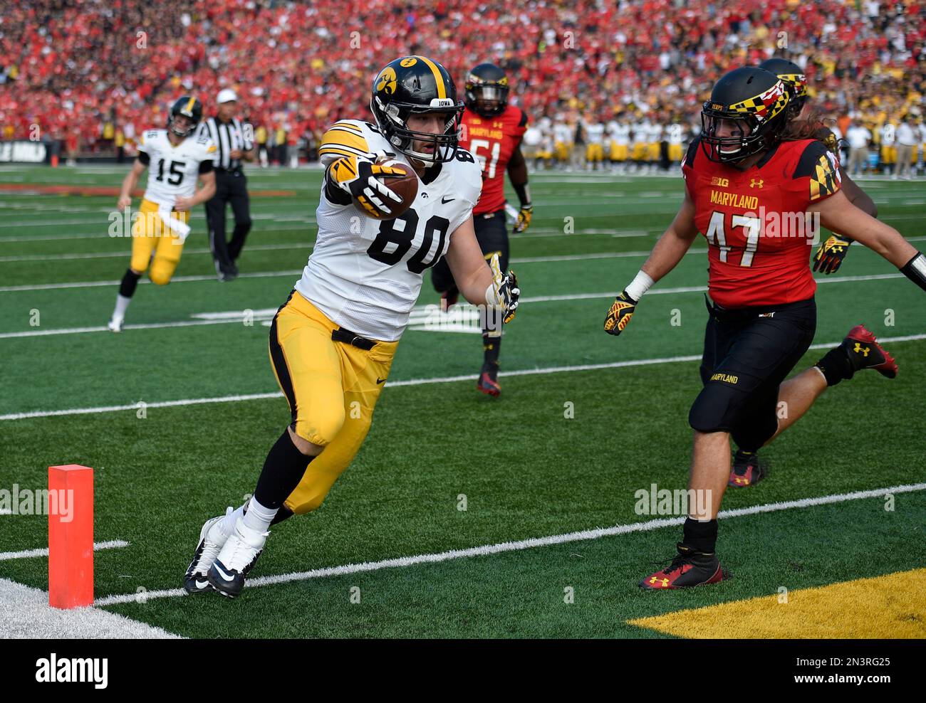 Iowa tight end Henry Krieger Coble (80) scores a touchdown against ...