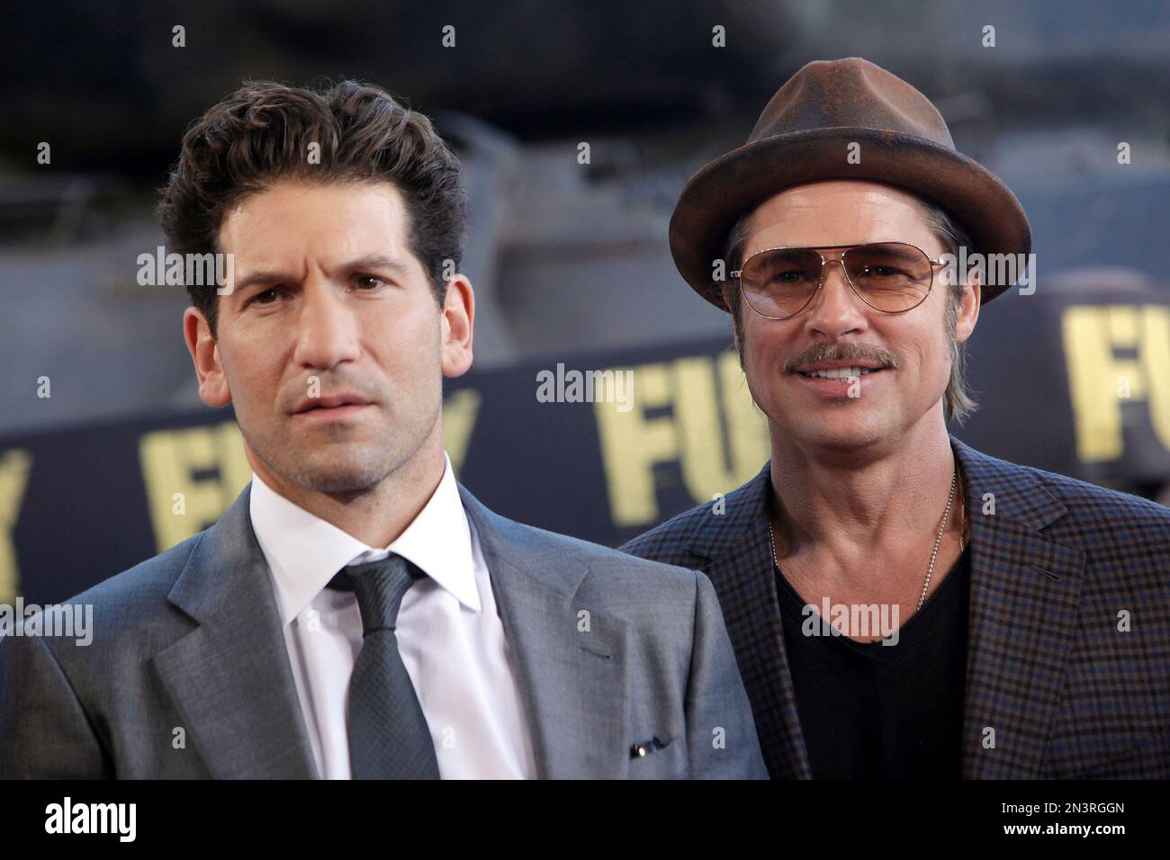 Actors Jon Bernthal, left, and Brad Pitt pose for photographers during ...