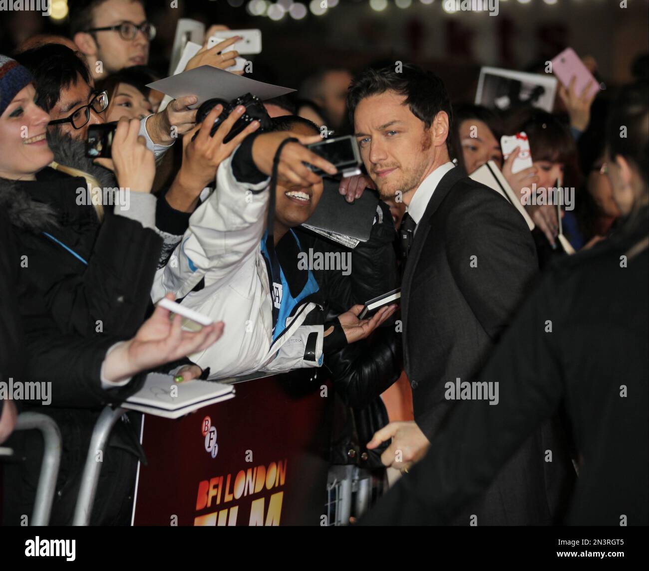 Actor James McAvoy signs autographs for fans upon arrival at the ...