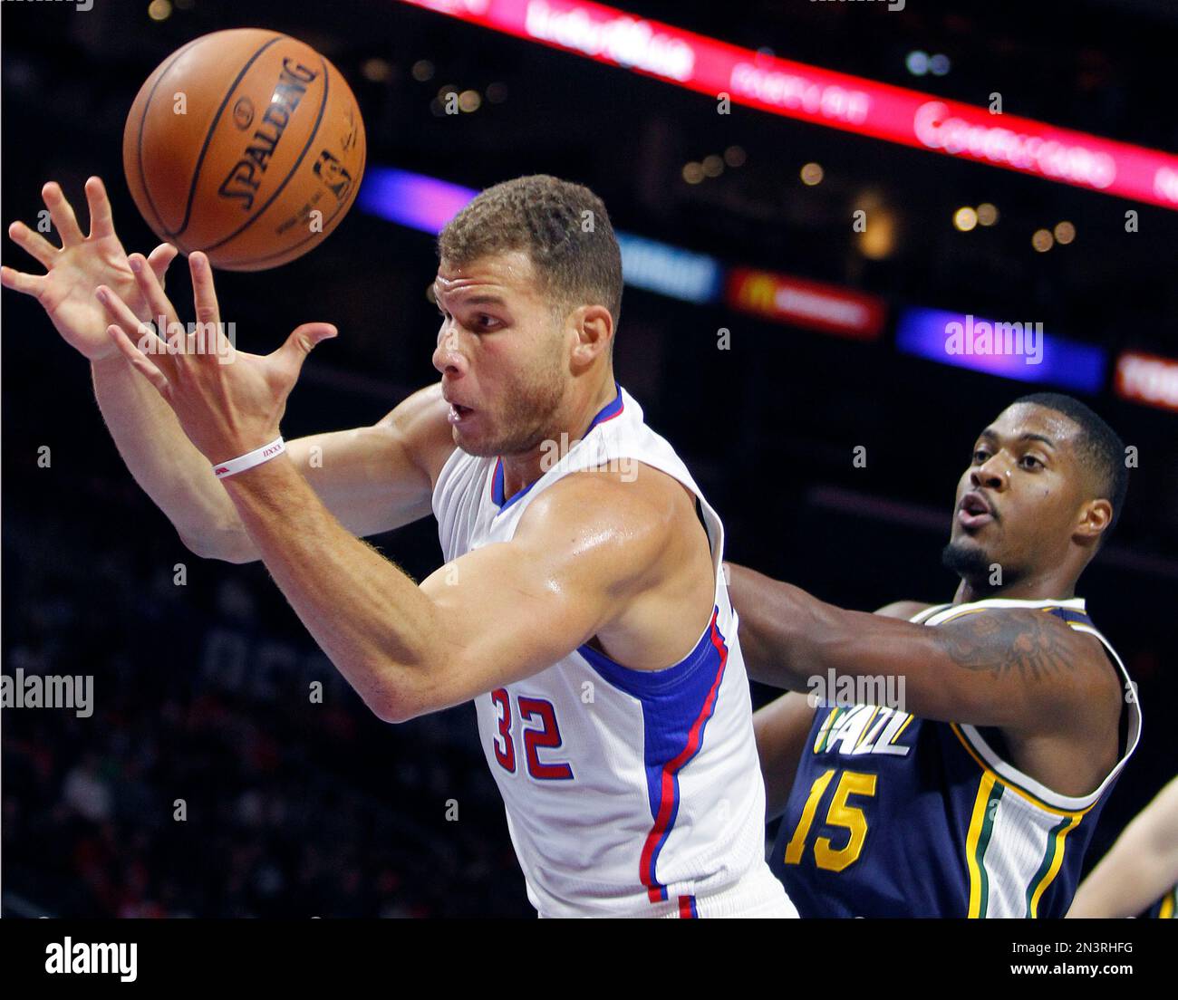 Los Angeles Clippers forward Blake Griffin, left, pulls down a pass ...