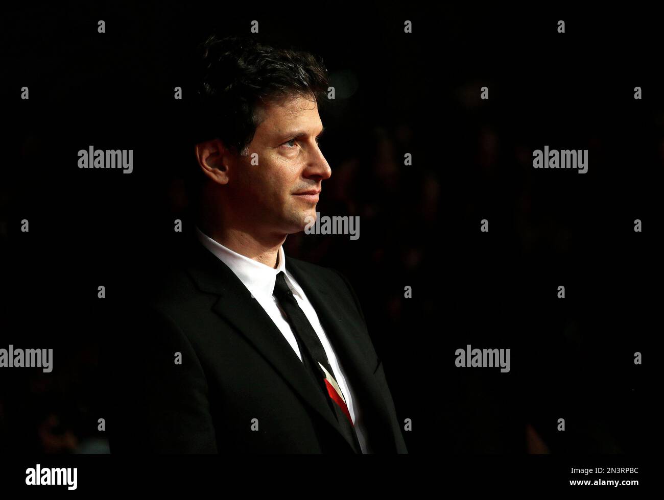Director Bennett Miller poses for photographers upon arrival at the ...