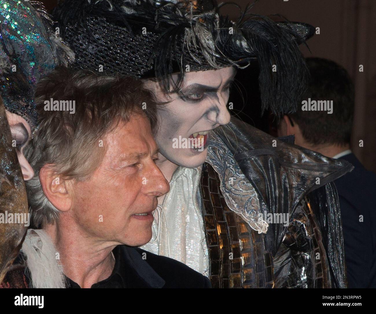 Director Roman Polanski, center, poses with actors dressed as vampires ...