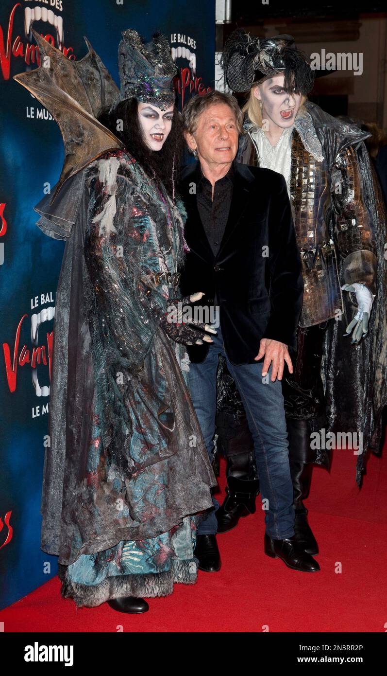 Director Roman Polanski, center, poses with actors dressed as vampires ...